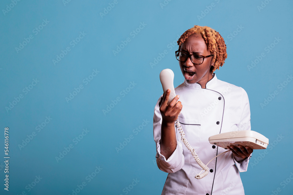 Annoying eatery woman chef yelling on landline call. Angry kitchen ...