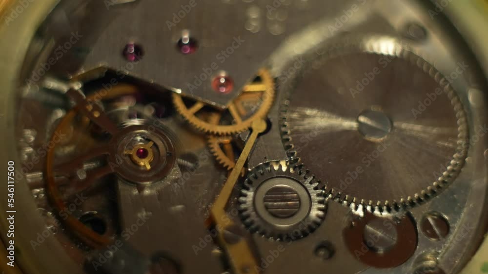 Mechanism of an old mechanical wrist watch chronometer in motion close ...