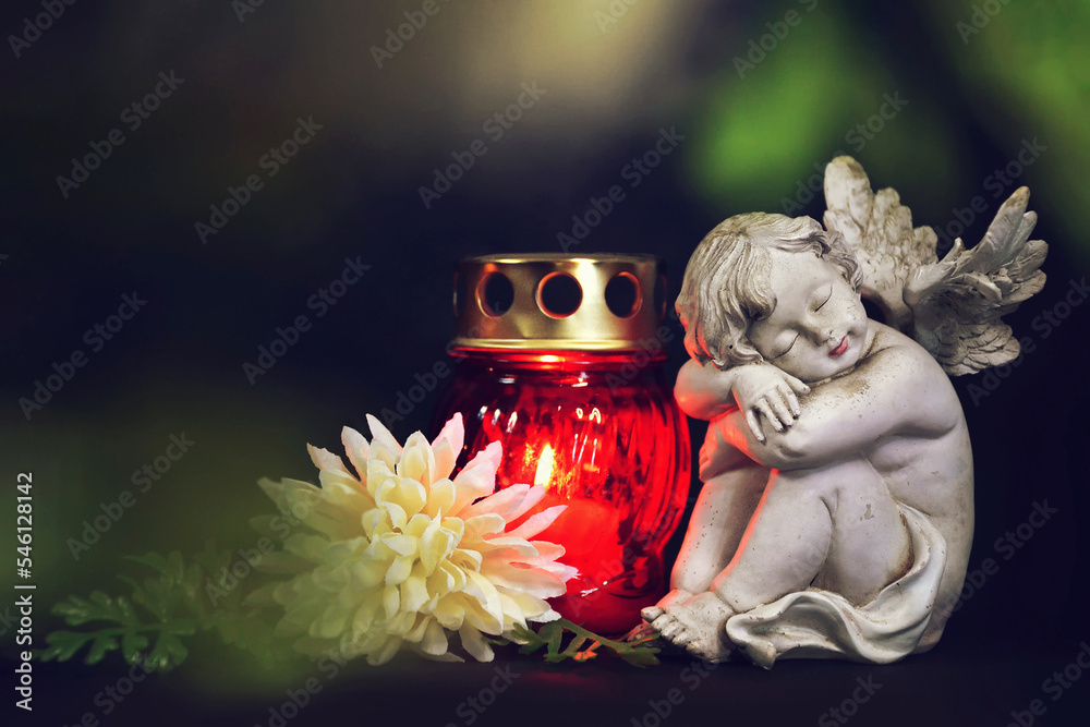 Condolence card. Funeral candle, flower and angel figurine on black ...