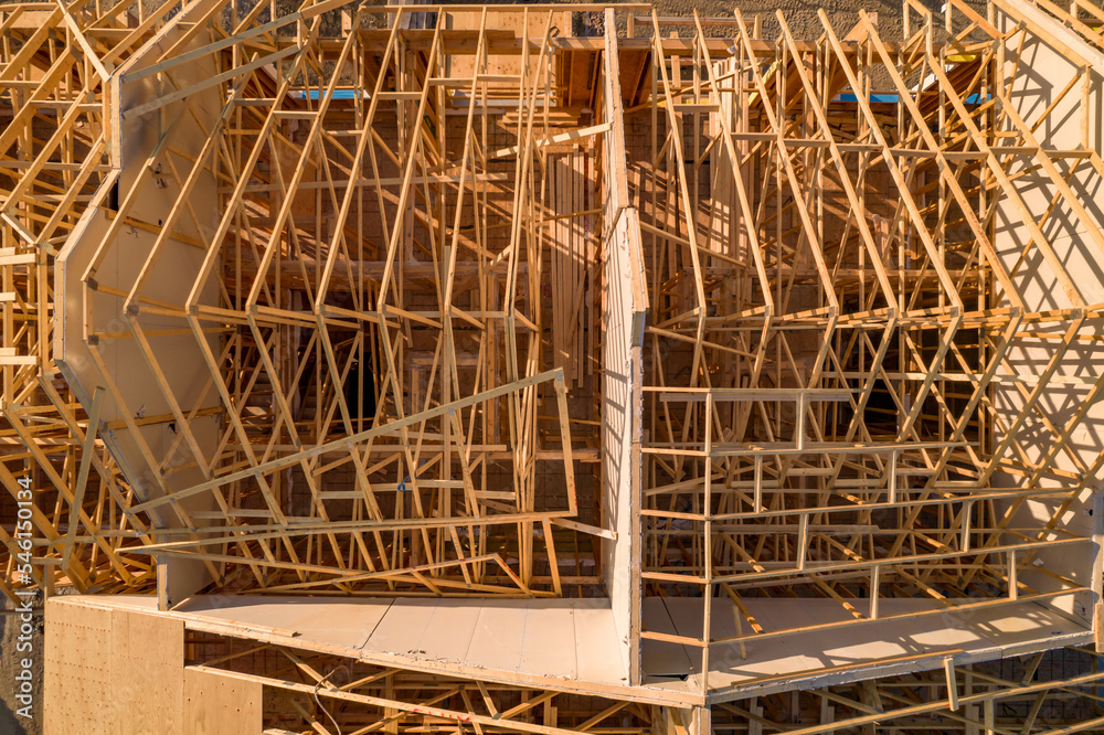 New city housing under construction made of stick framing structure and ...