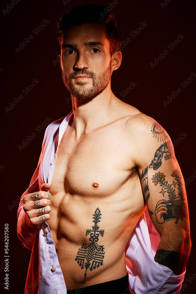 Fashion, sexy and portrait of a man in a studio with muscles, body and ...