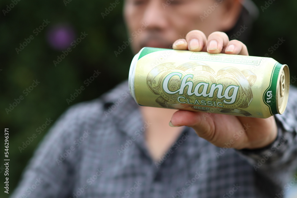 ‎Chiang Mai Thai 11 ‎August 2021 In hand of a young man holding a can ...