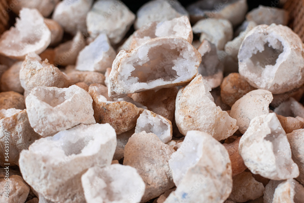 cross-section of a white hollow stone with crystal inside with ...