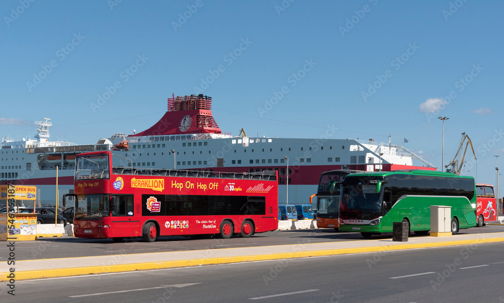 Heraklion, Crete, Greece. 2022. Hop on hop off city tour buses wait for ...