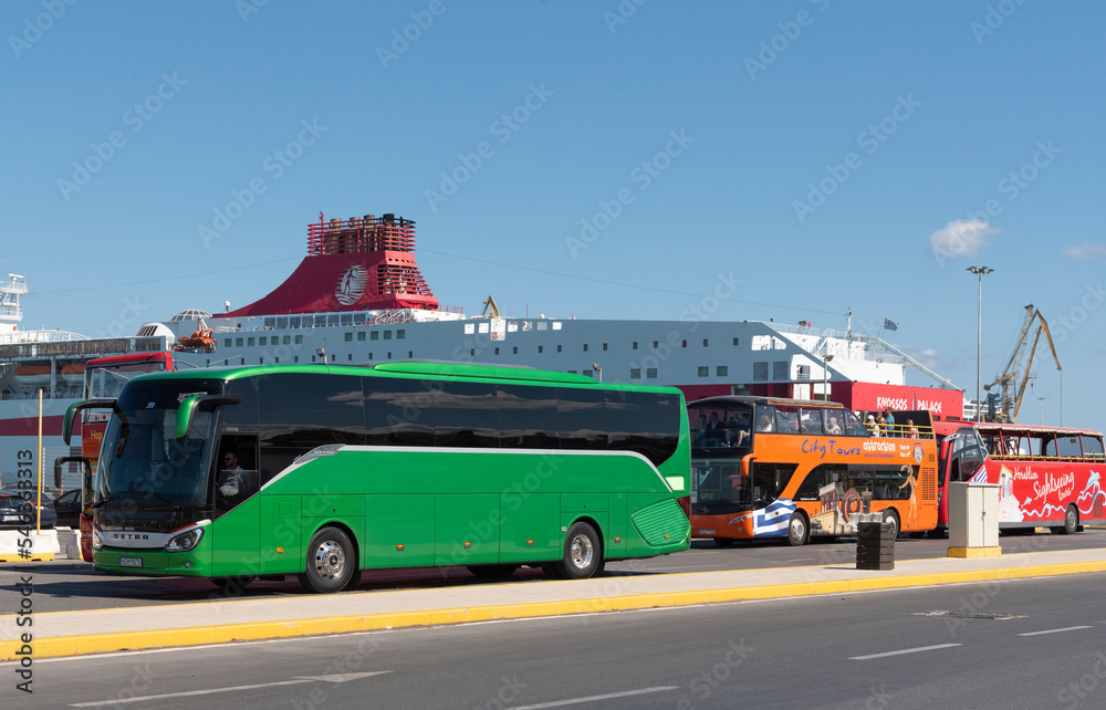 Heraklion, Crete, Greece. 2022. Hop on hop off city tour buses wait for ...