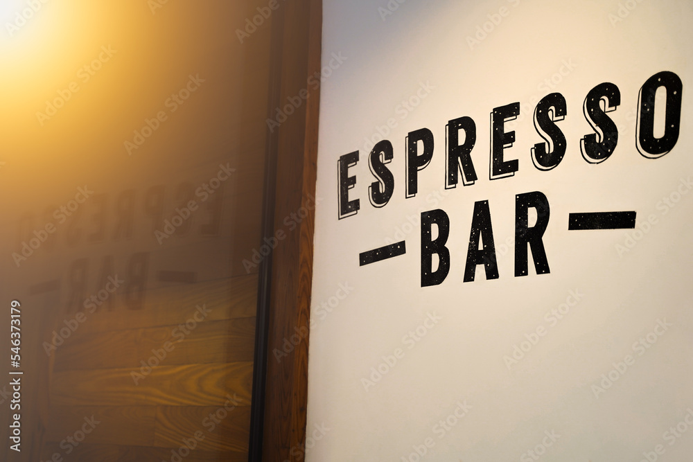 An inscription of a front coffee shop, on a wall cafe font typography ...