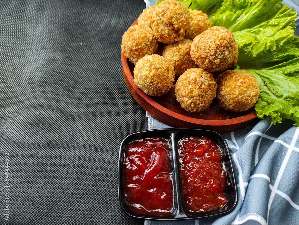 Brulee Bomb or Bitterballen, homemade snack from smoked beef, carrot ...