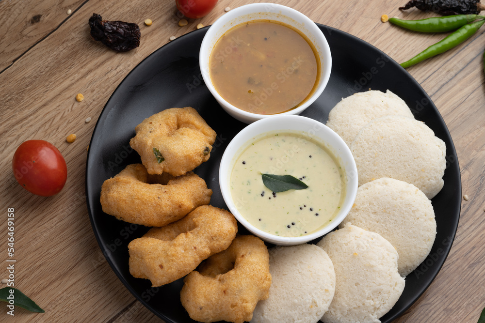 South Indian breakfast-Idli, sambar, wada, coconut chutney. Served in ...