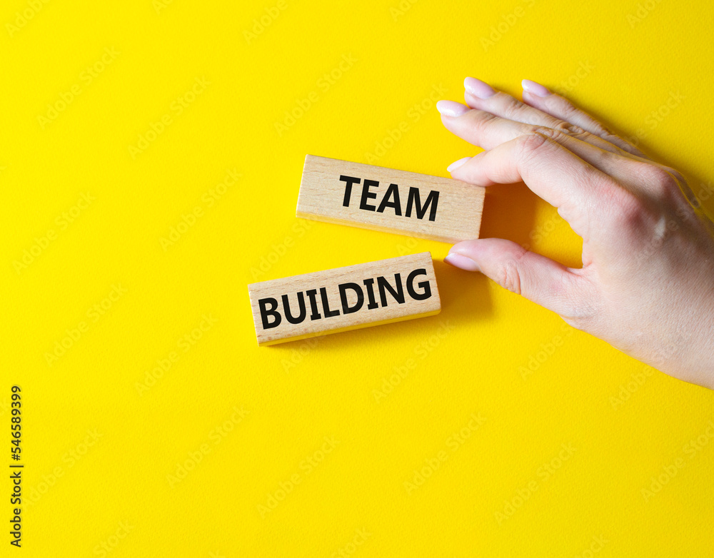 Team Building symbol. Concept word Team Building on wooden blocks ...