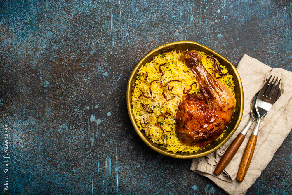 Delicious Indian dish Biryani chicken with basmati rice in metal brass ...