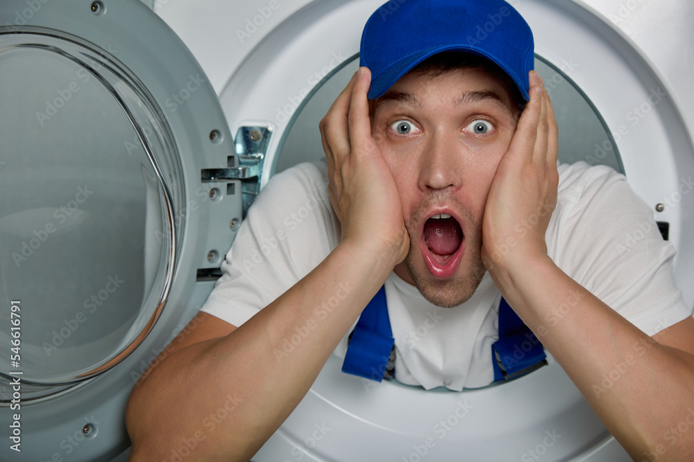 Caucasian worker clutched his head in horror when he saw discounts on ...