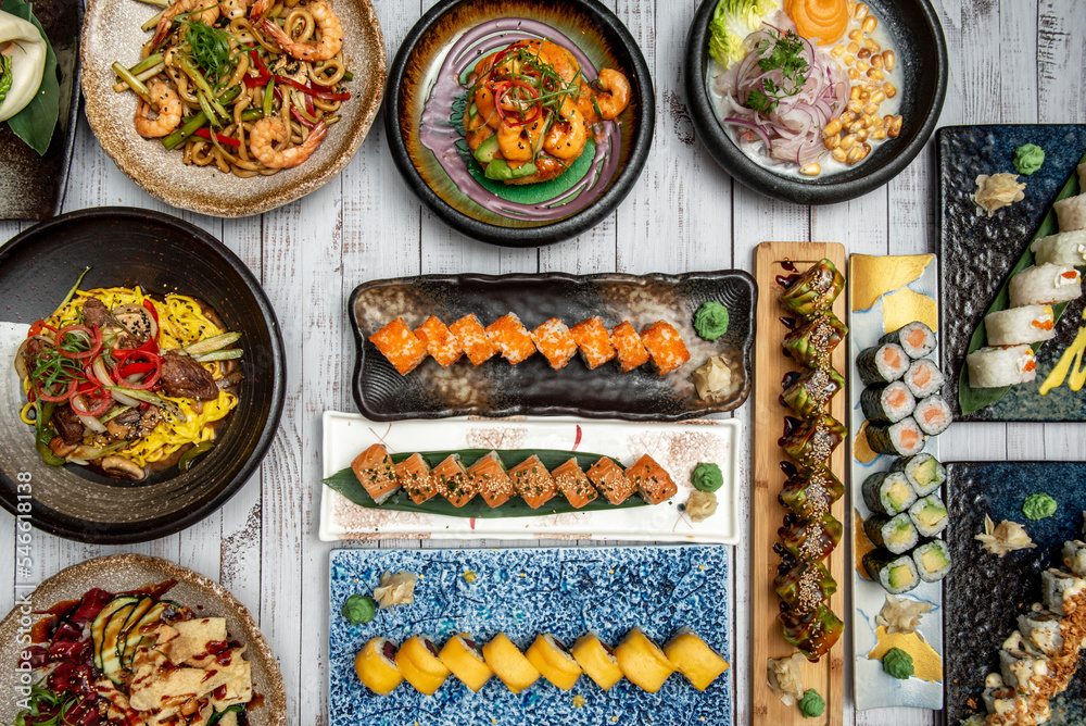 Peruvian Japanese fusion food platter with ceviche, pan bao, prawn stew ...