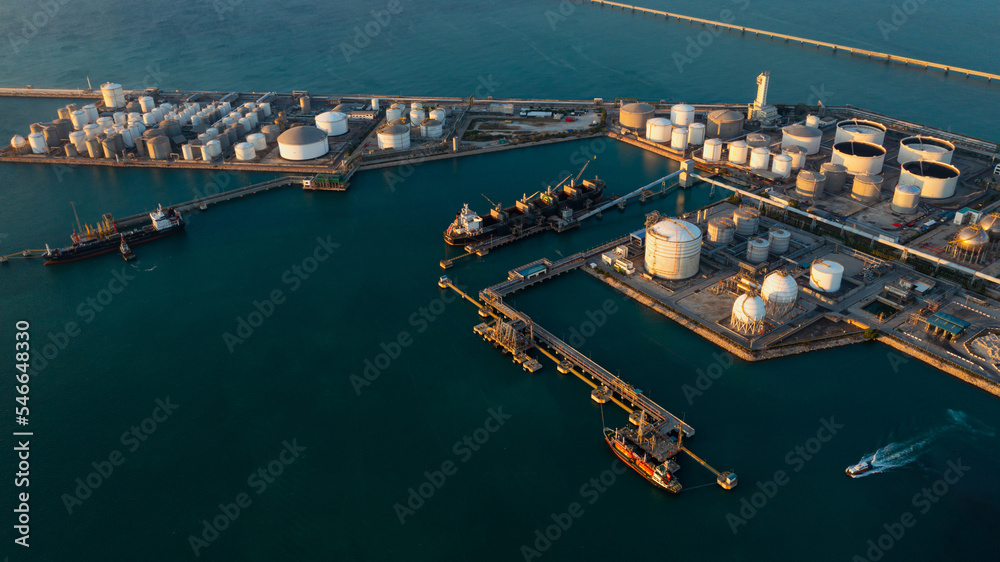 Aerial view of twilight petrochemical oil refinery plants at industrial ...