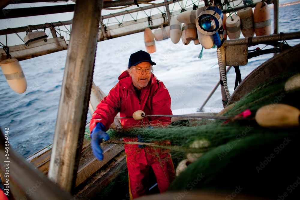 The founder of Loki Fish, Inc., lays out his net aboard the salmon ...