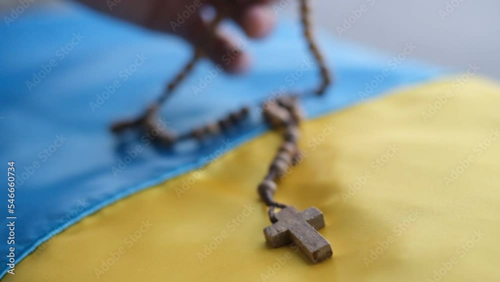 Christian cross on the Ukrainian flag. Religion concept. Prayer for ...
