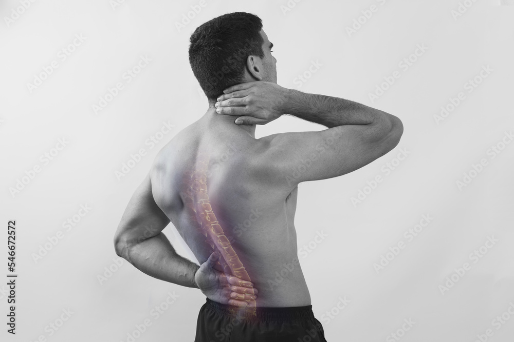 the man keeps one hand behind his back and on the nape of the neck ...