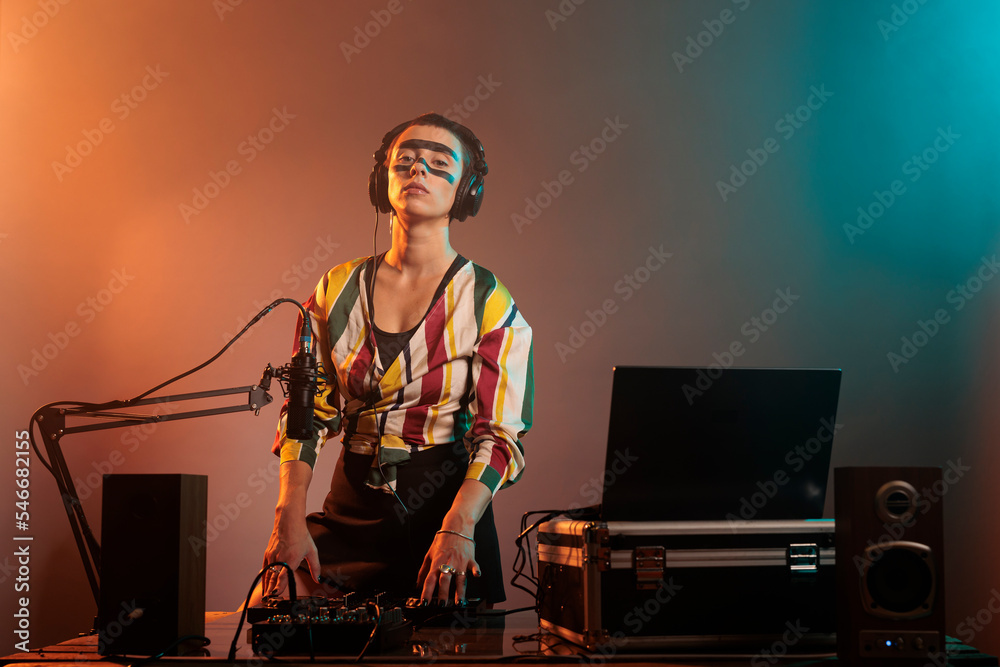 Cheerful Musical Artist Working As Dj With Turntables Mixing Techno Music With Bass And Audio