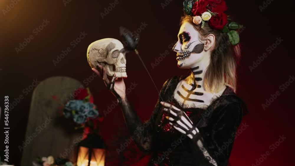 Santa muerte model acting flirty with skull and black roses, wearing ...