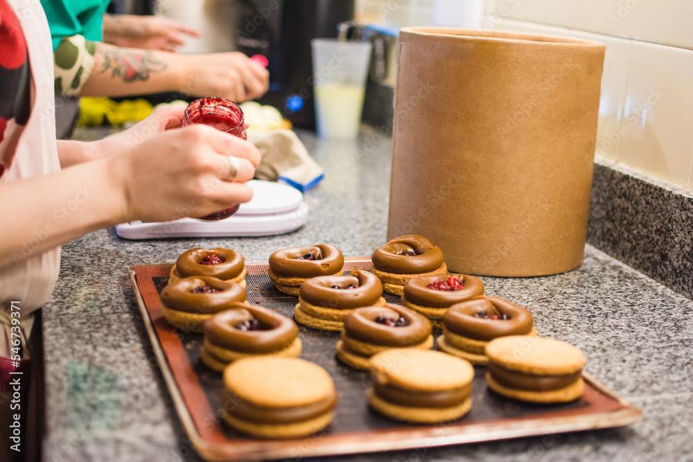 Worker making delicious dessert Stock Photo | Adobe Stock