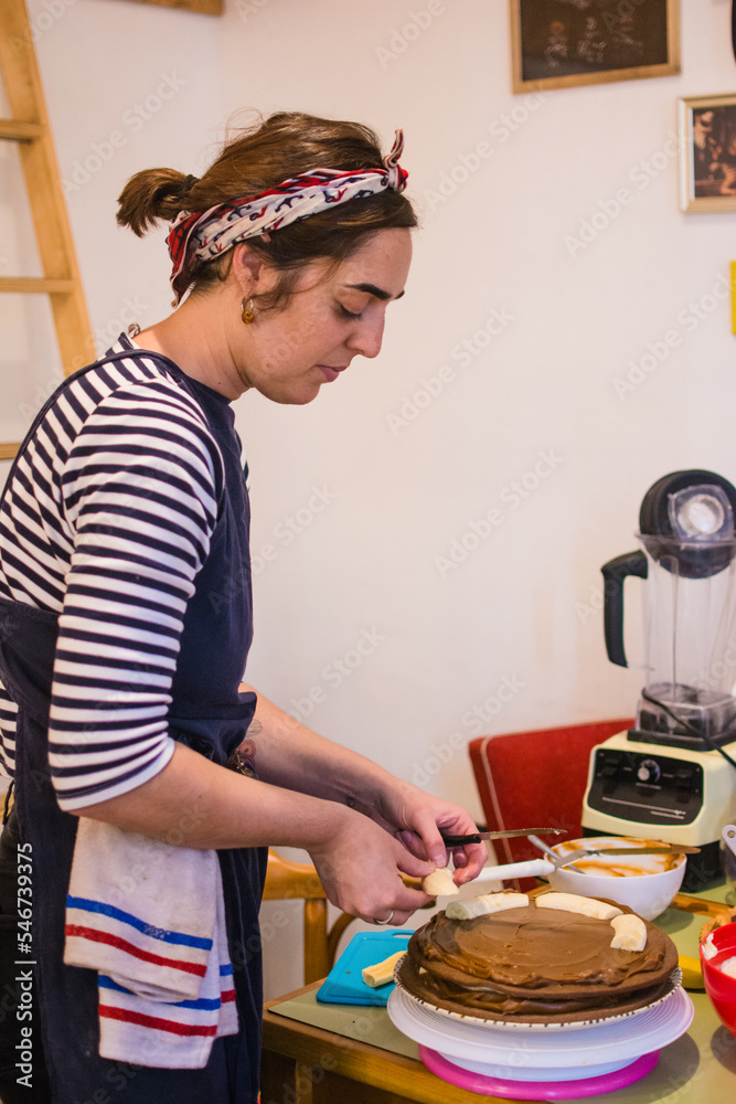 Baker making a cake Stock Photo | Adobe Stock