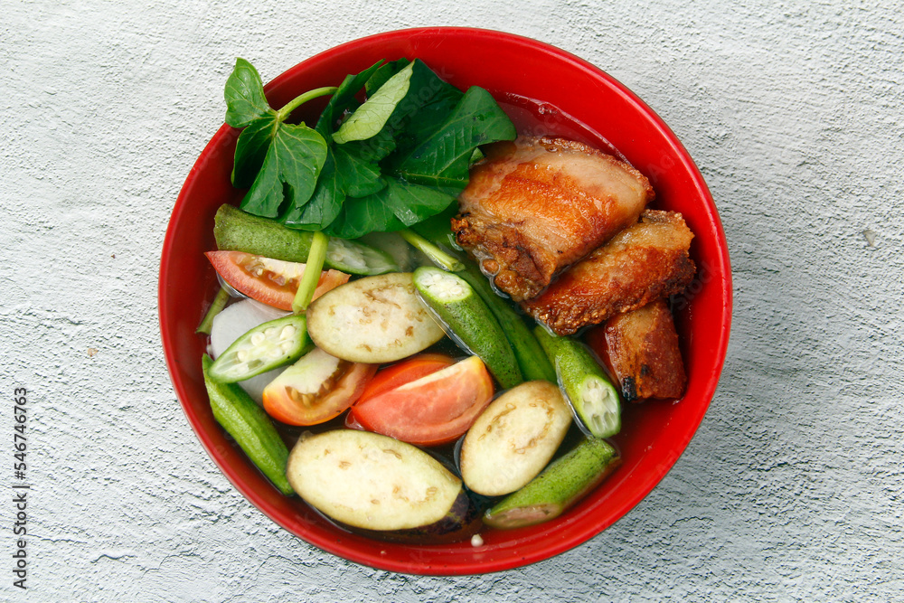 Freshly cooked Filipino food called Sinigang na crispy liempo Stock ...