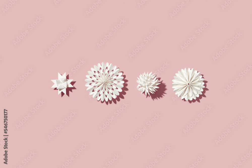 Simple papercraft stars and snowflakes . Stock Photo | Adobe Stock
