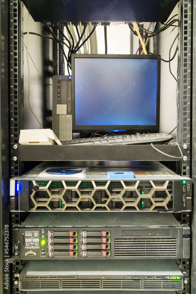 Monitor in a server rack Stock Photo | Adobe Stock