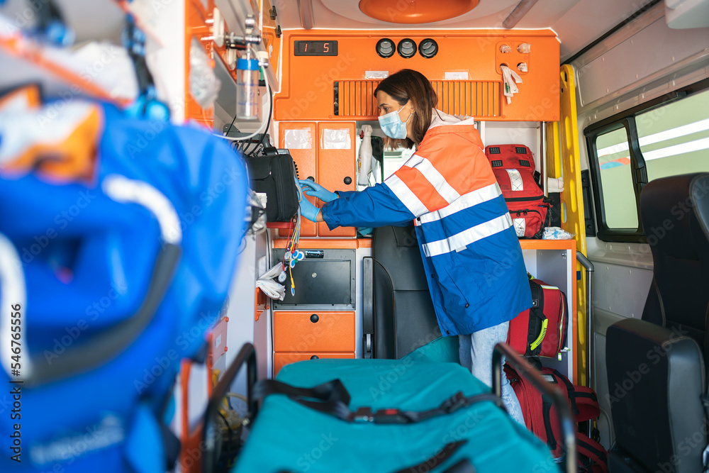 Paramedic Working In Ambulance Stock Photo | Adobe Stock