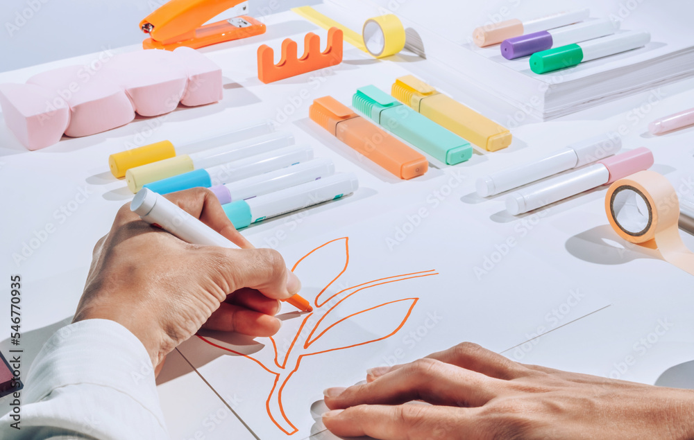 Draftsman drawing with pen . Stock Photo | Adobe Stock