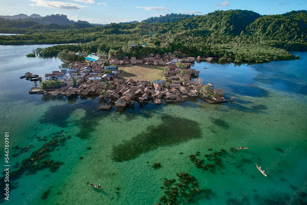 Traditional indigenous South Pacific Islander stilt village houses ...
