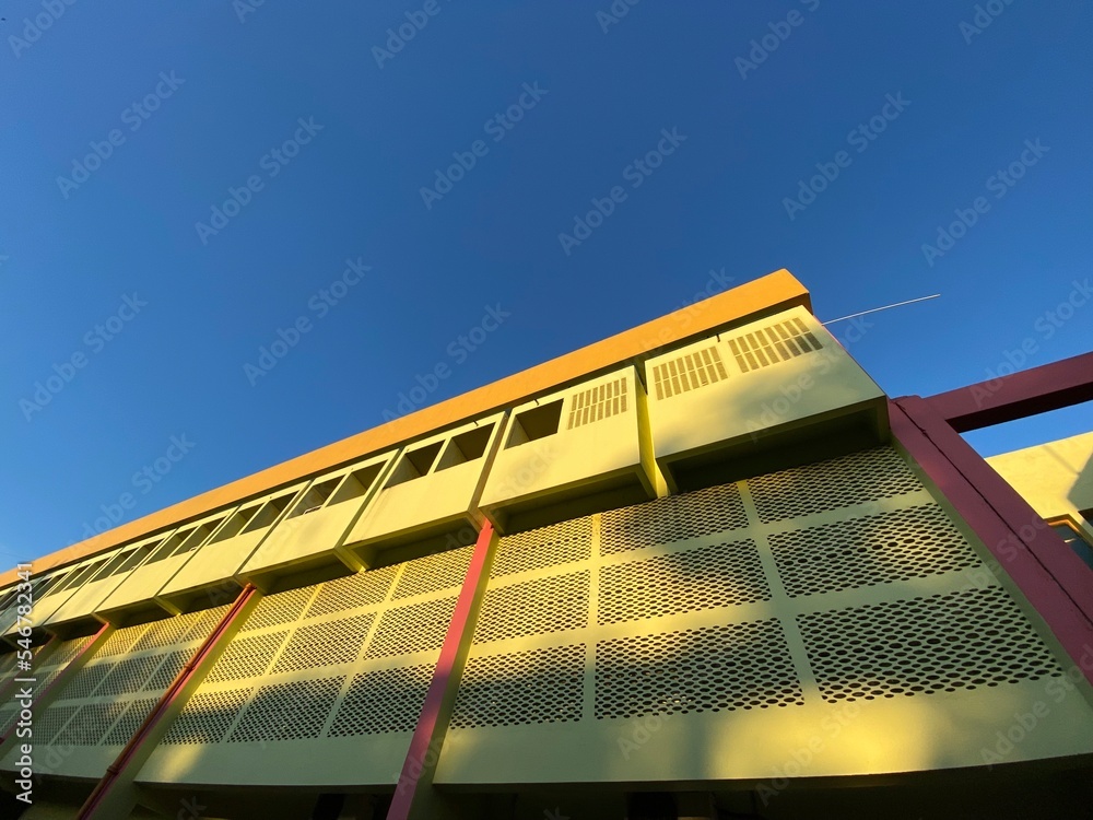 Building with azure blue sky at backdrops with light and shade Stock ...