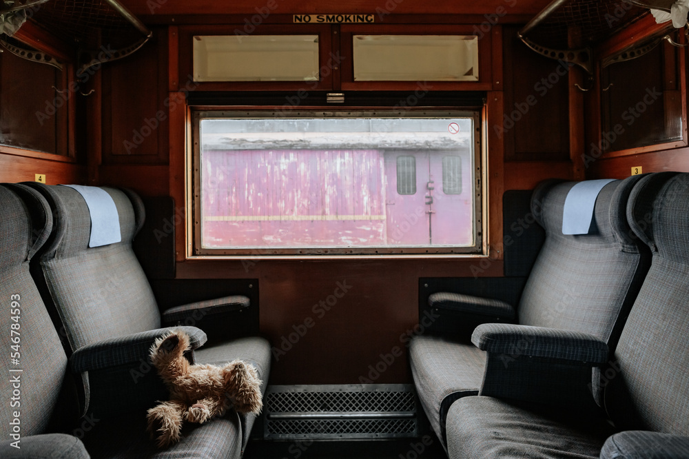 Teddy bear on a train Stock Photo | Adobe Stock