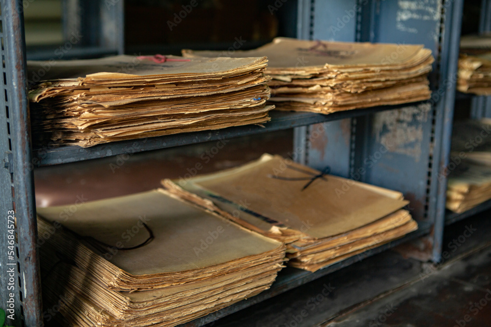 Very old books sitting on the shelves in the library. Books as a symbol ...