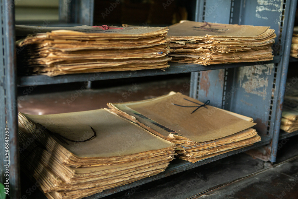 Very old books sitting on the shelves in the library. Books as a symbol ...