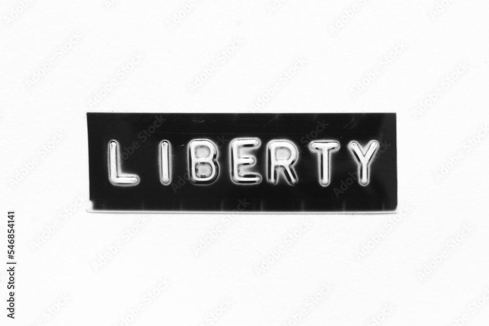 Black color banner that have embossed letter with word liberty on white ...
