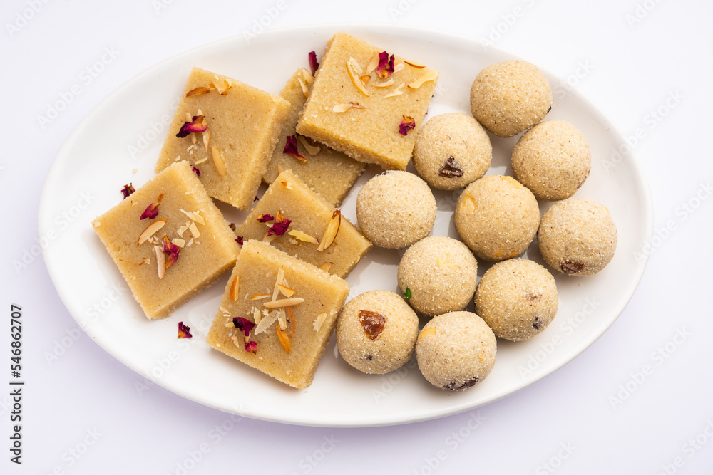 Rava barfi with laddu also called sooji burfi and Laddoo. Indian Sweet ...