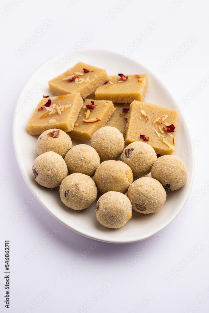 Rava barfi with laddu also called sooji burfi and Laddoo. Indian Sweet ...