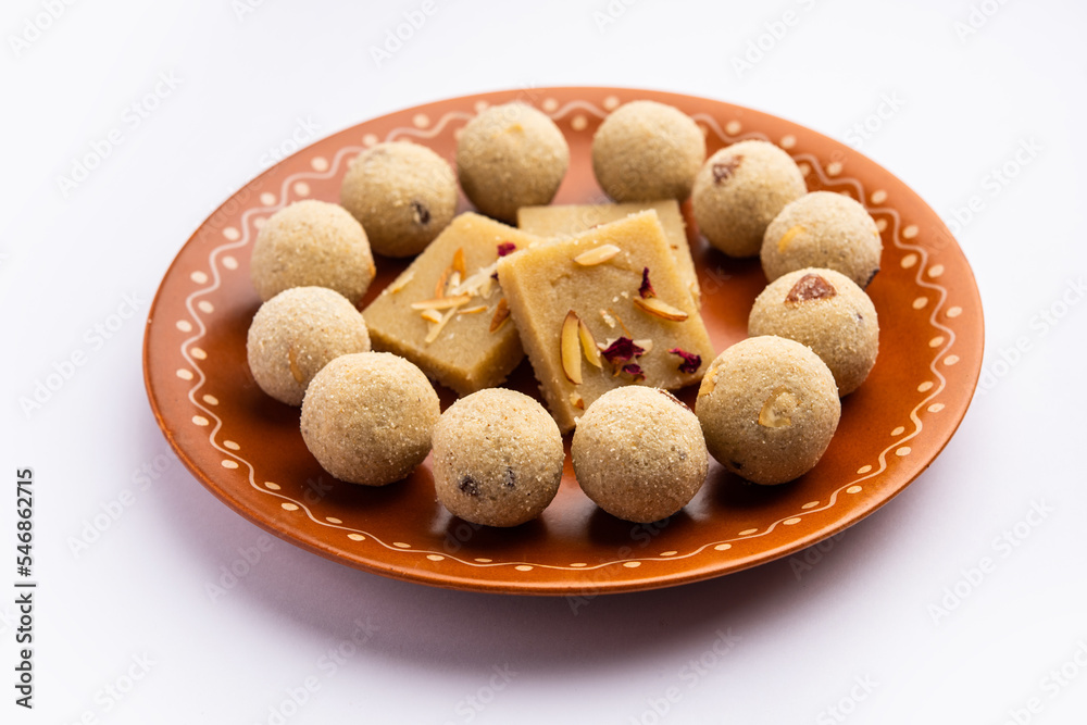 Rava barfi with laddu also called sooji burfi and Laddoo. Indian Sweet ...