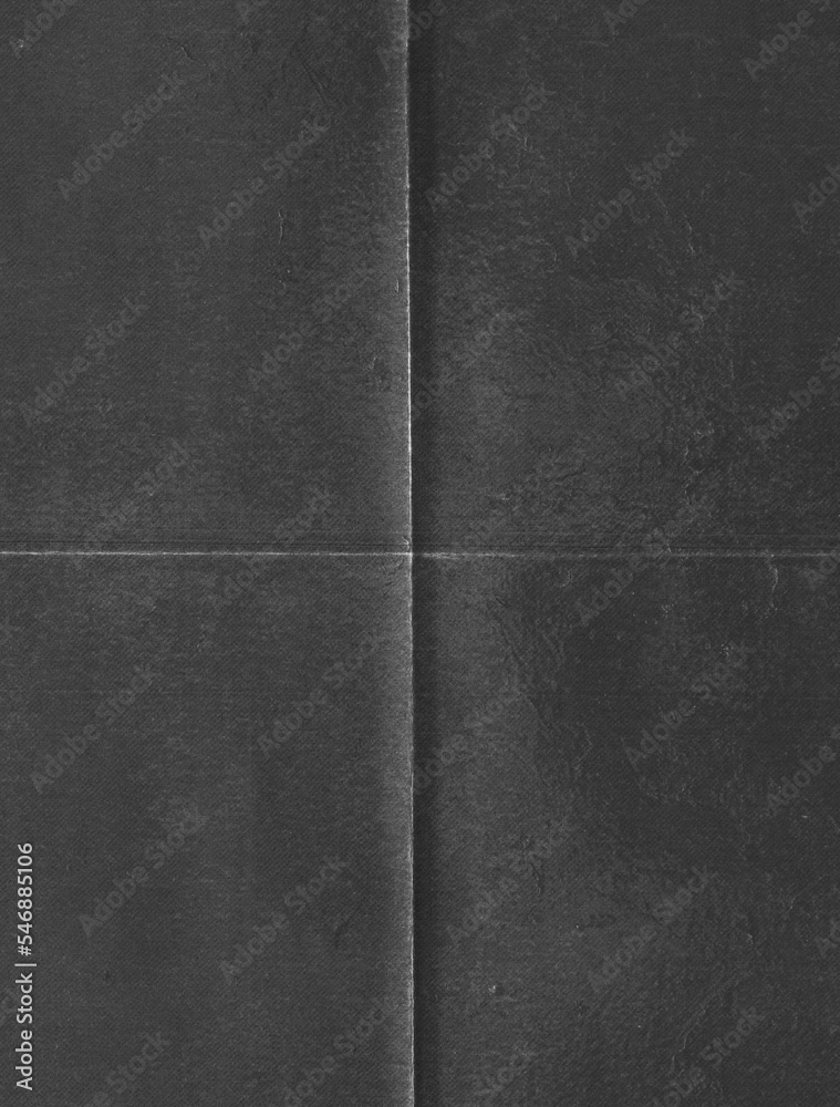 Texture of folded paper with dark toner ink, top view or detail scan of ...