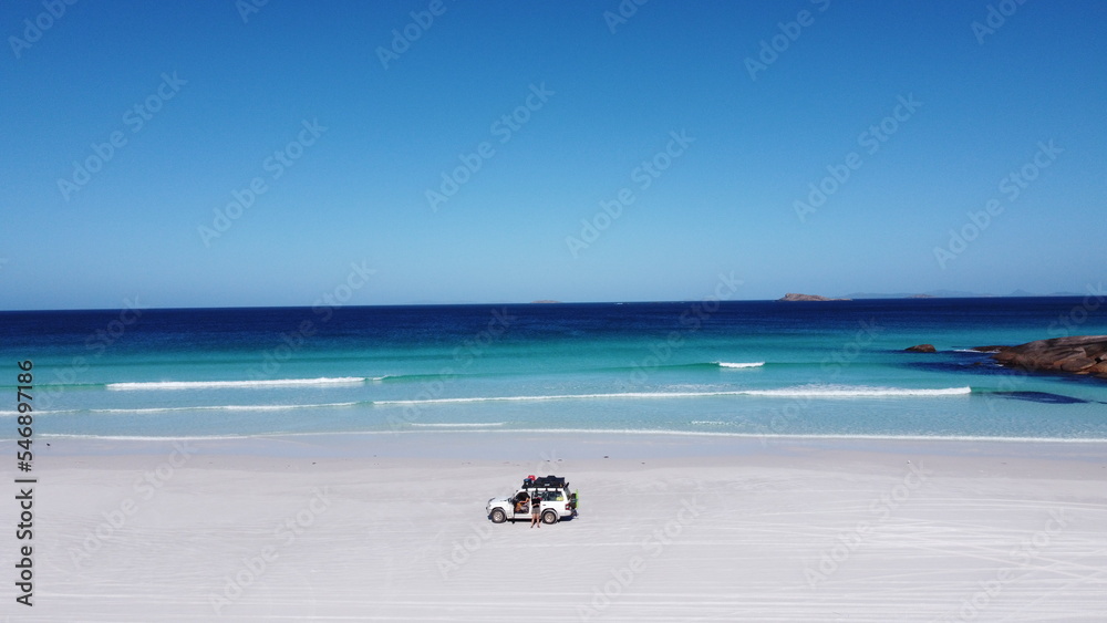 Aerial picture of a car parked at the beach. View from the sky ...