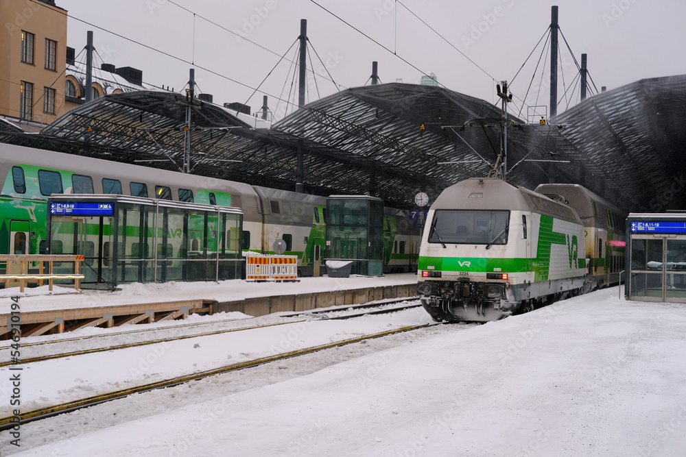 InterCity white train of Finnish railways on platform of Helsinki ...