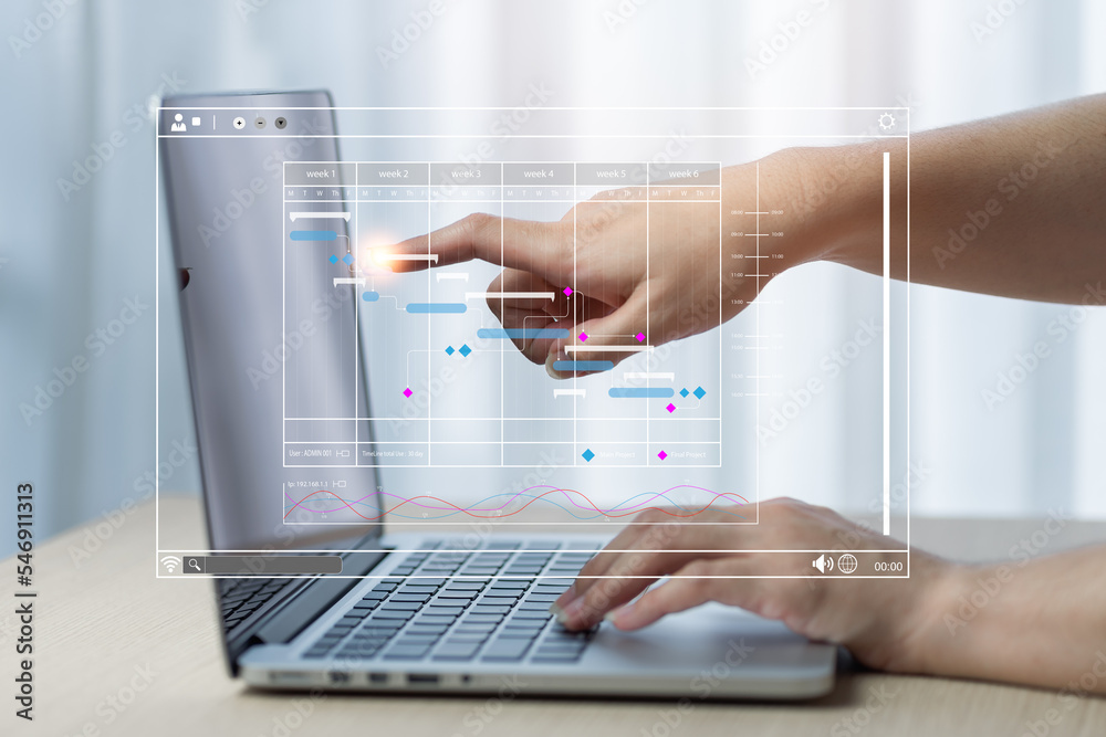 Analyst working with computer in Business Analytics and Data Management ...