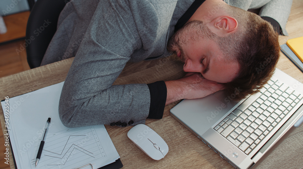 Bored sleepy businessman programmer software developer in formal wear ...