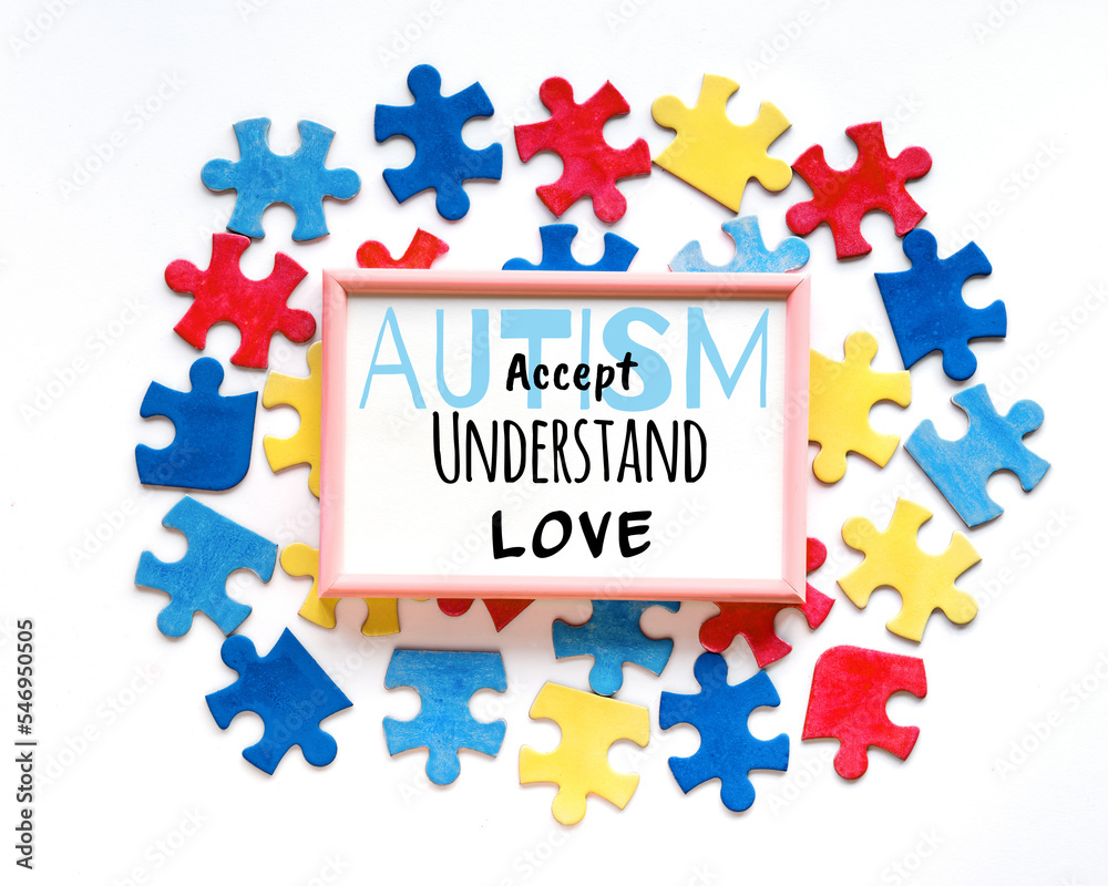 Text World Autism Awareness Month, April, frame with puzzle pieces ...
