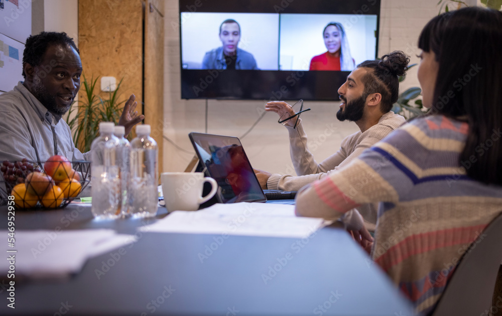 Business people video conferencing in meeting Stock Photo | Adobe Stock