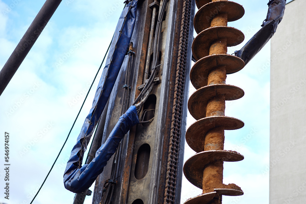 Drilling rig for digging piles for building construction. Stock Photo ...