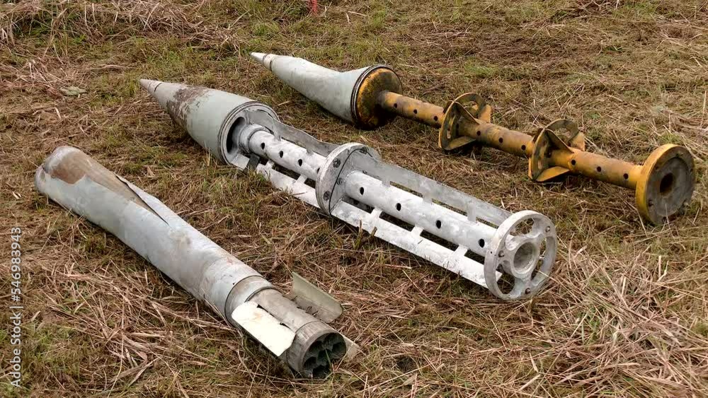 Remnants of cluster munitions on the ground. Clearance of unexploded ...