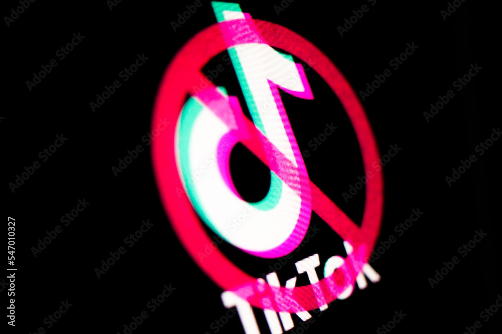 TikTok banned. Logo on the screen Stock Photo | Adobe Stock