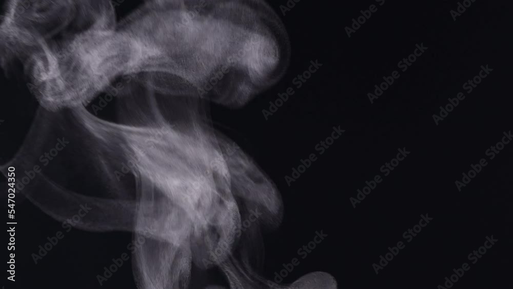 Close up white steam smoke vapor rising up from hot coffee cup ...