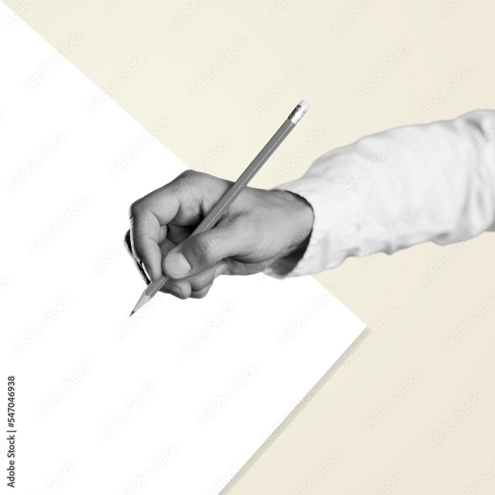 Human hand hold pencil with white paper. Stock Photo | Adobe Stock